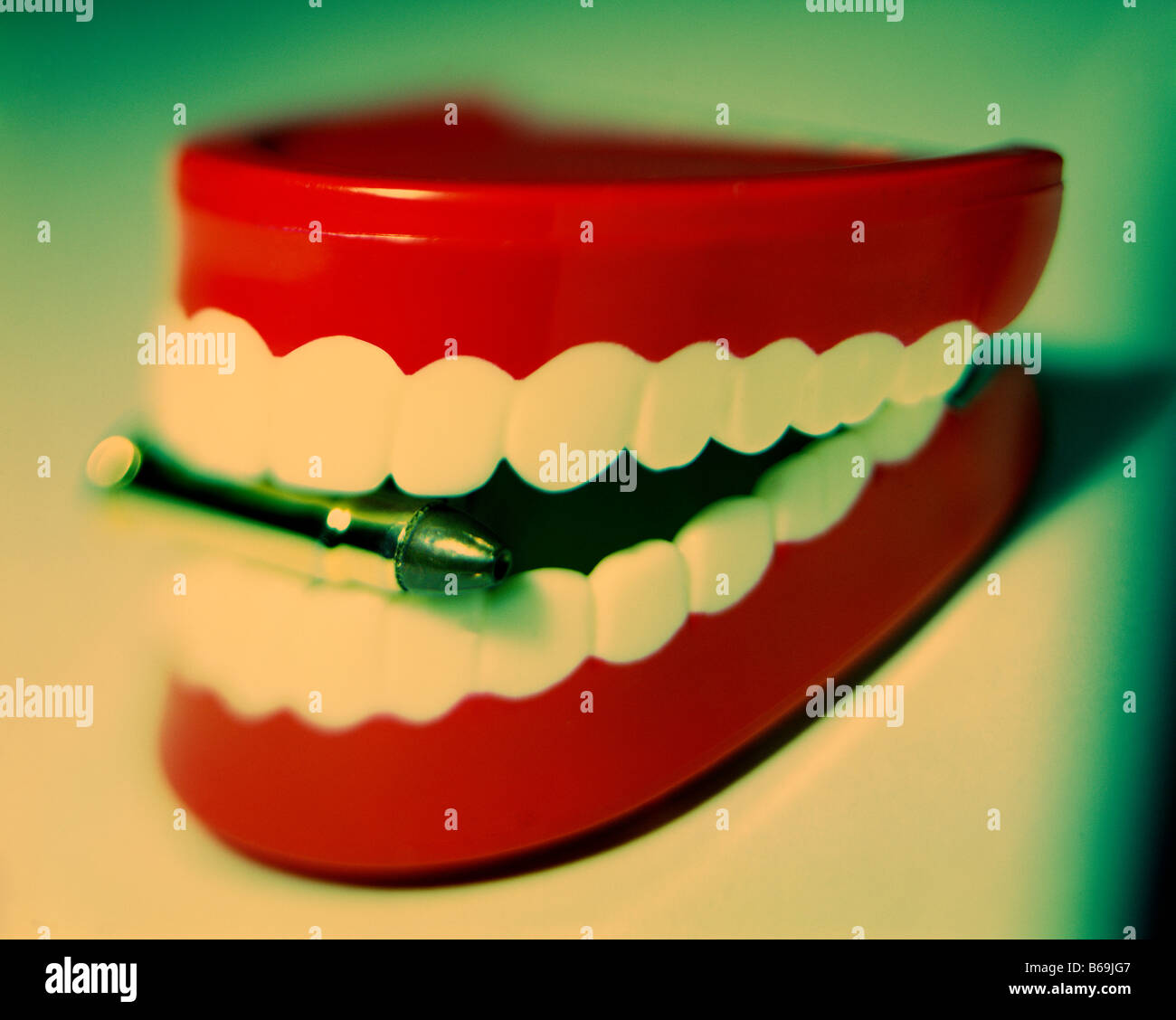 Bite bullet hi-res stock photography and images - Alamy