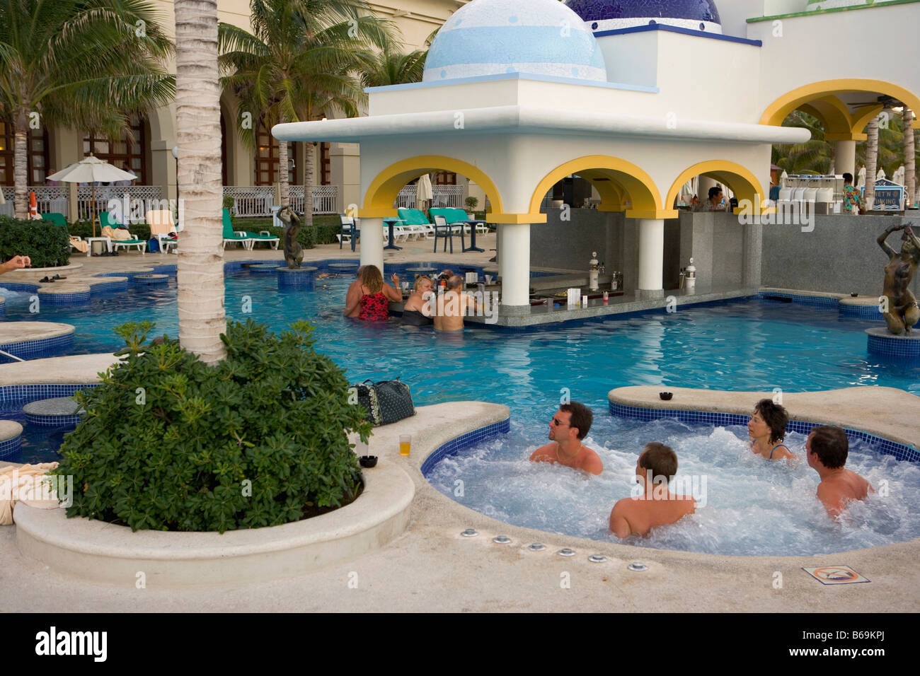 Mexico, Cancun, Quintana Roo, Swimming pool of hotel RIU Stock Photo ...