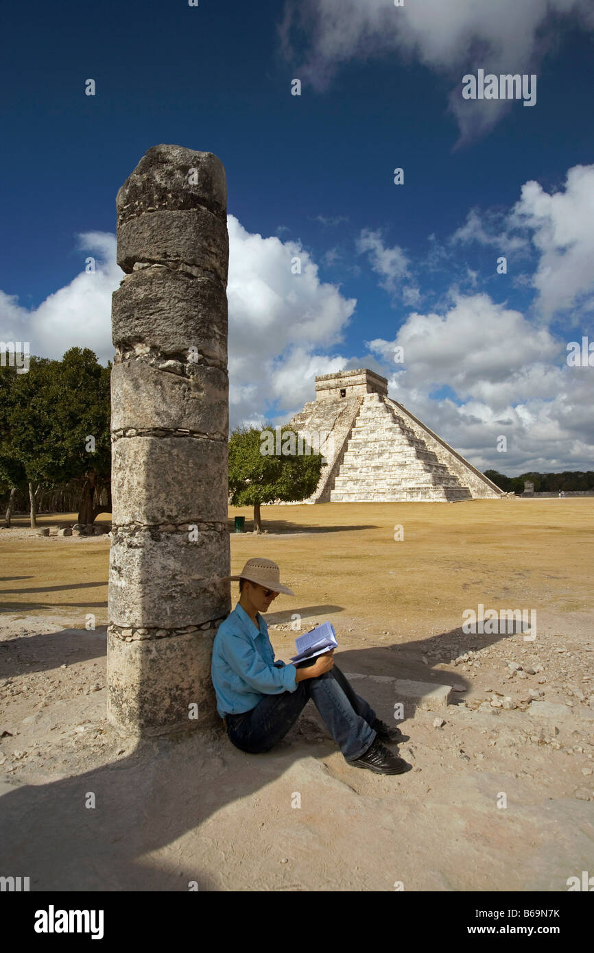 Mexico, Yucatan, Chichen Itza, Tourist reading book Stock Photo - Alamy