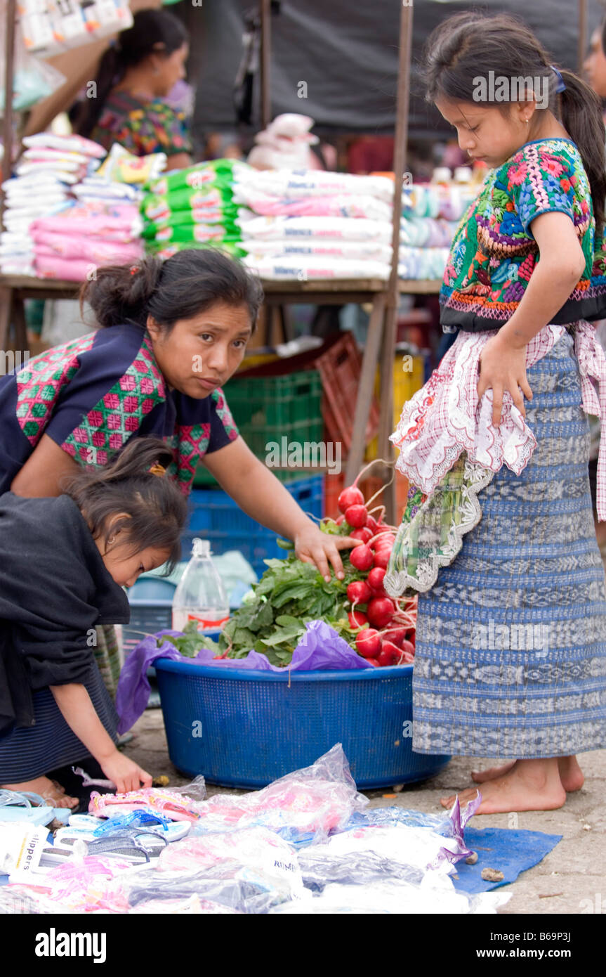 Indigenous women in colourful traditional dress on the market of Santa ...
