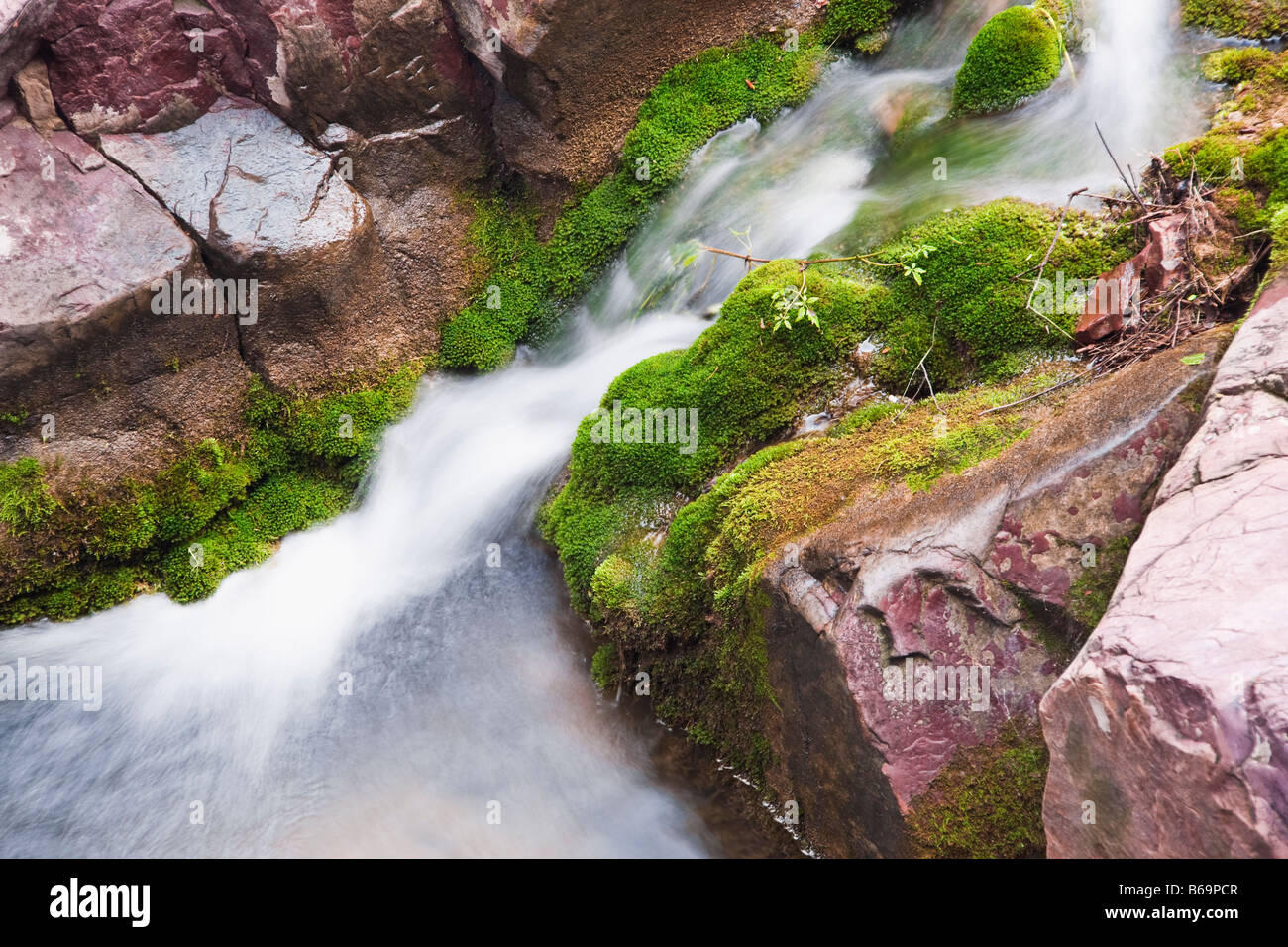 Stream flowing through rocks day hi-res stock photography and images ...