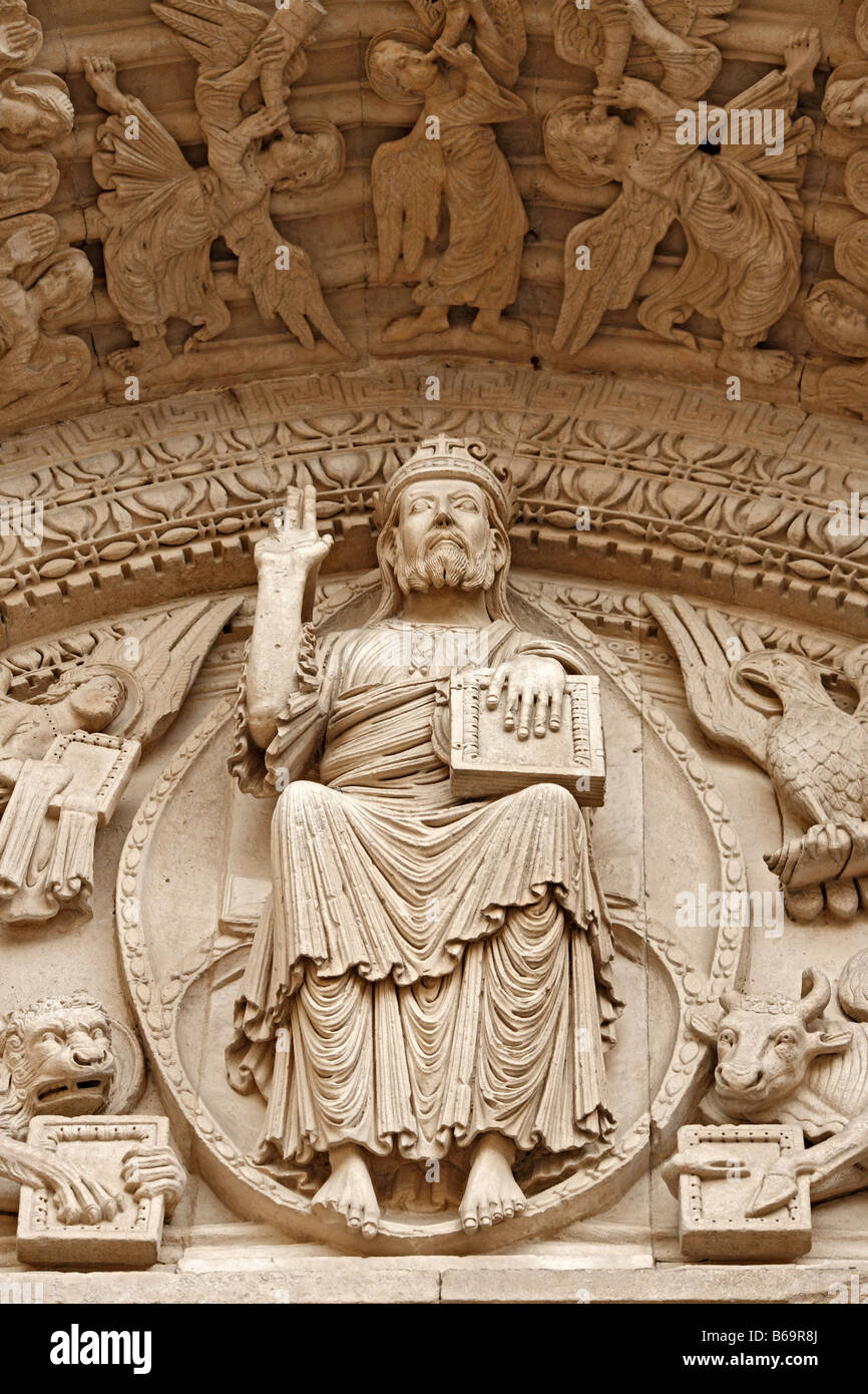 Romanesque stone bas relief on portal of the Saint Trophimus cathedral ...