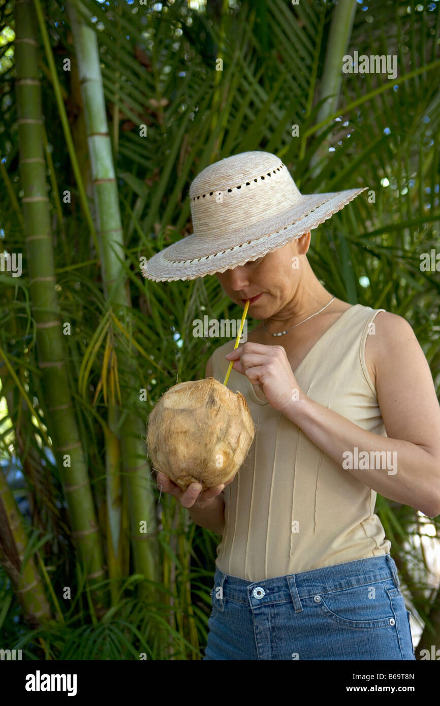 Mexico, Chiapas, Palenque, Woman drinking coconut, Tourist Stock Photo ...