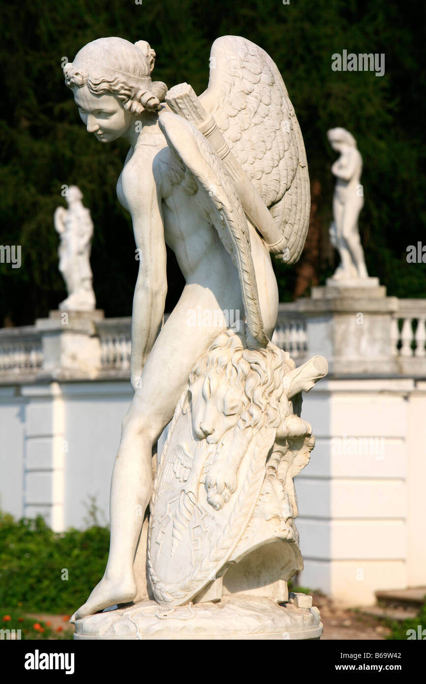 A neoclassical statue of an angel in the gardens of the 18th century ...