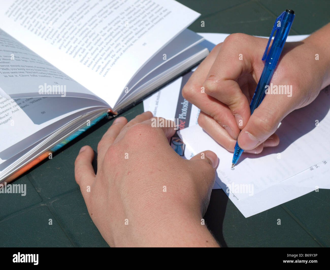 Hands Writing With Pen and paper Stock Photo - Alamy