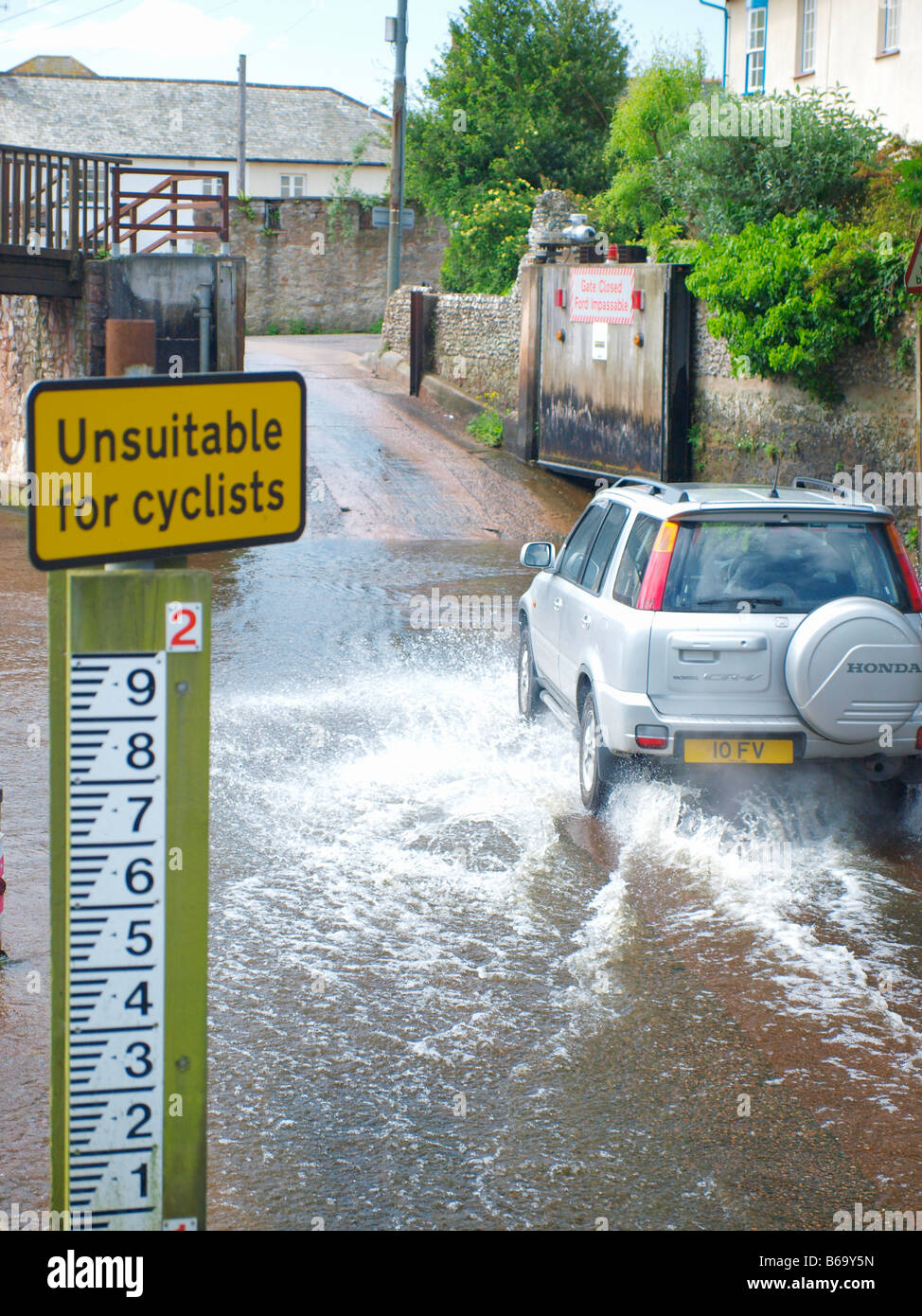 Car travelling through ford hi-res stock photography and images - Alamy