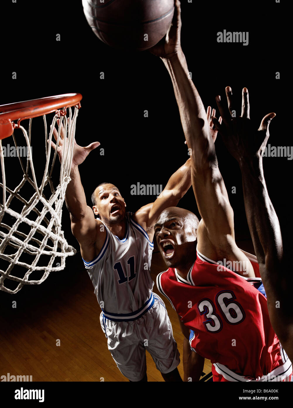 African basketball player scoring Stock Photo - Alamy