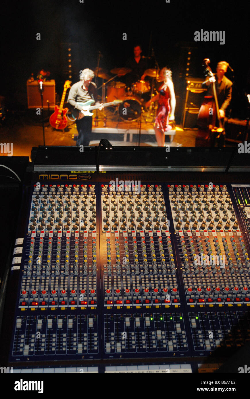Sound technician at work at rock concert Stock Photo - Alamy