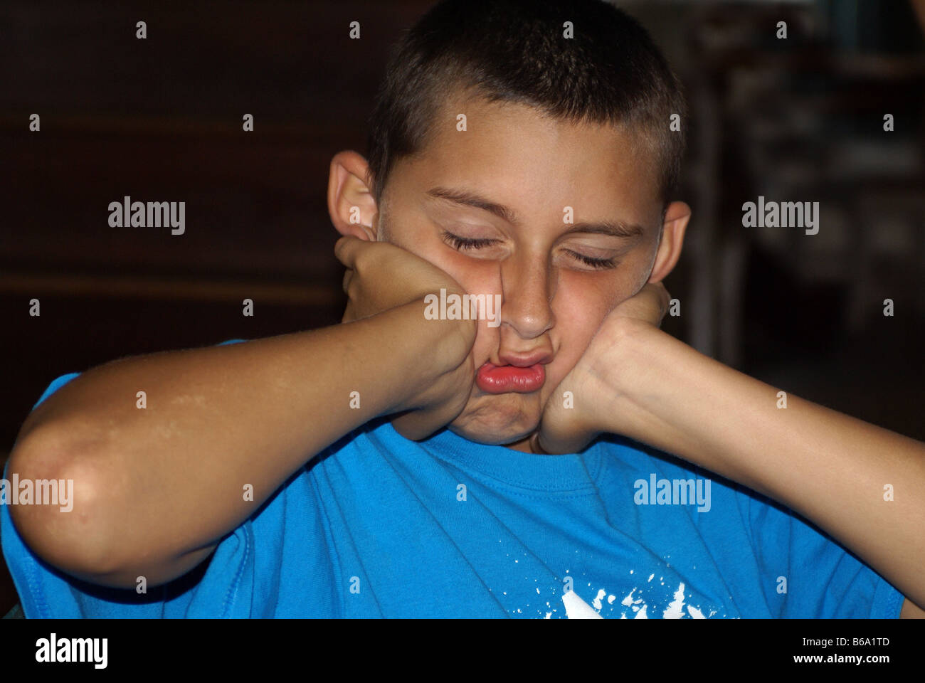 Squeezing cheeks hi-res stock photography and images - Alamy Squeezing cheeks hi-res stock photography and images - Alamy