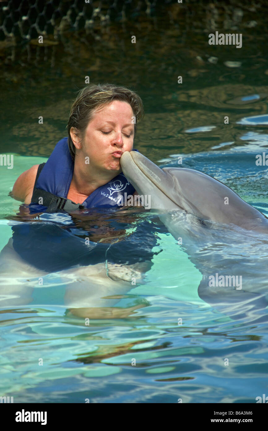 Dolphin kissing woman hi-res stock photography and images - Alamy