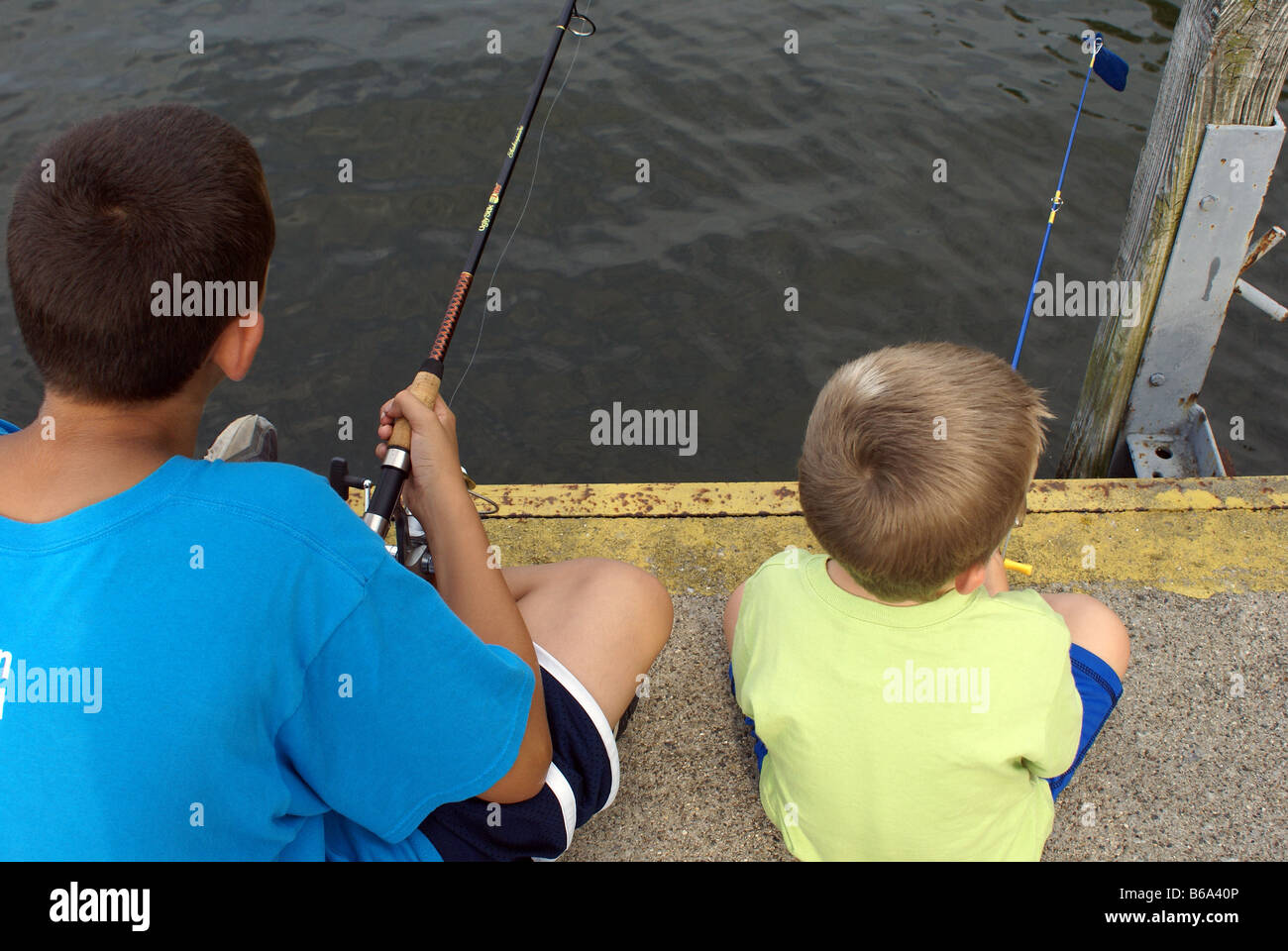 3 boys fishing hi-res stock photography and images - Alamy