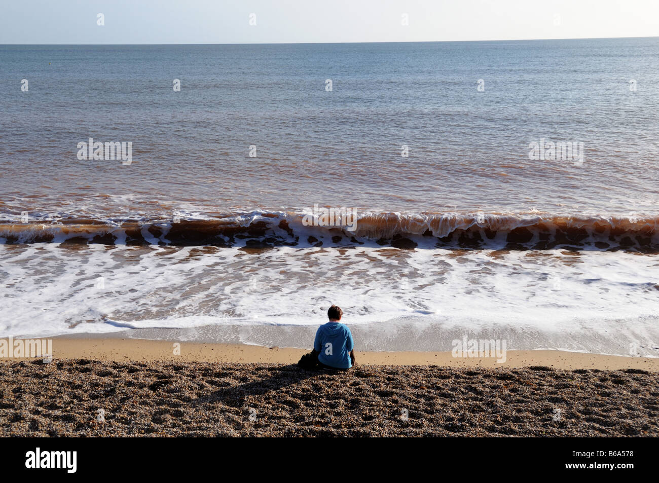 Incoming waves on beach hi-res stock photography and images - Alamy