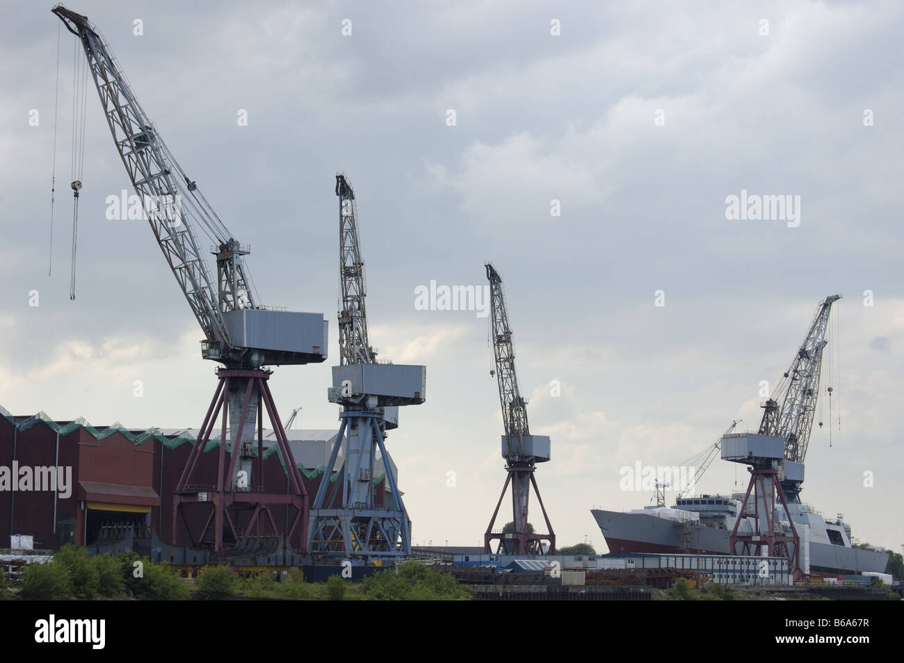 View of naval ship under construction at Govan shipyard from Partick in ...