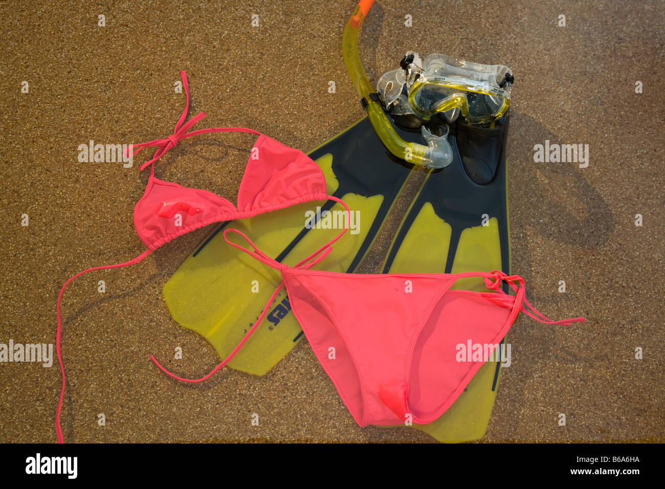 Swimwear floating in a shallow pool Stock Photo - Alamy