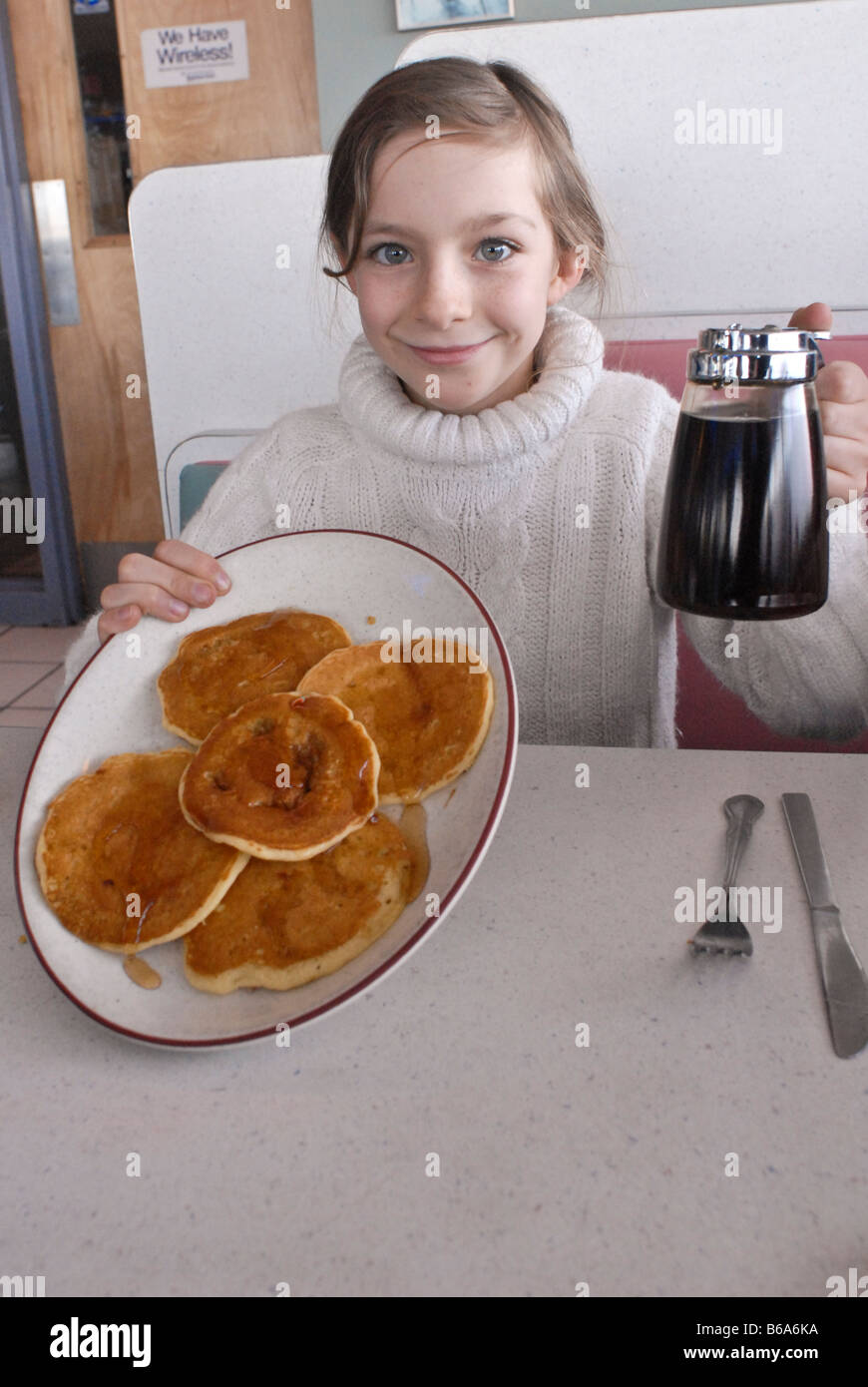 Child and pancakes Stock Photo - Alamy