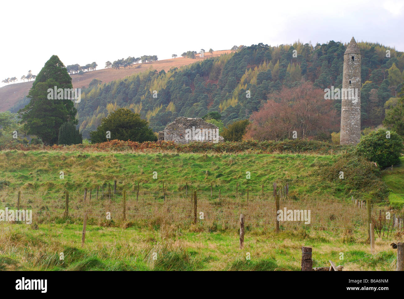 Round tower in Glendalough (valley of the two lakes) is an early ...