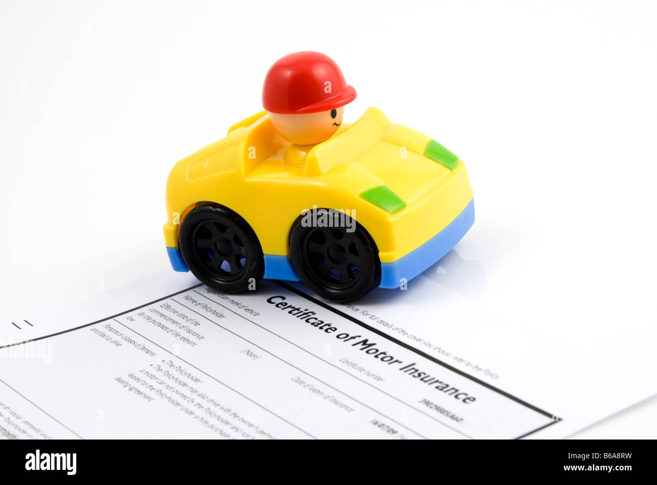 car insurance with a toy plastic car Stock Photo - Alamy