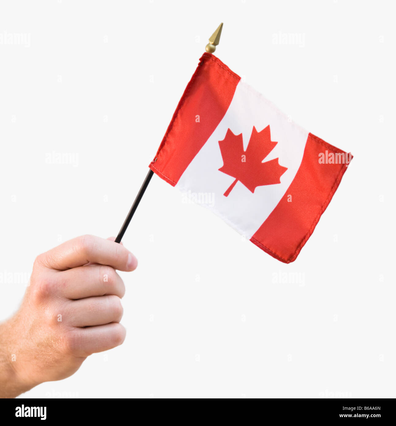 Person holding Canadian flag, close-up Stock Photo - Alamy