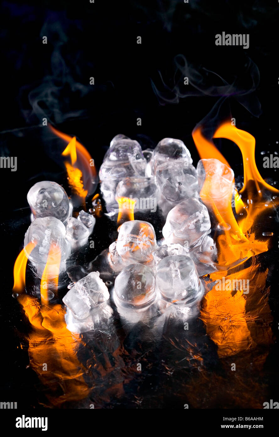 ice cubes sizzle as they melt in flames Stock Photo - Alamy