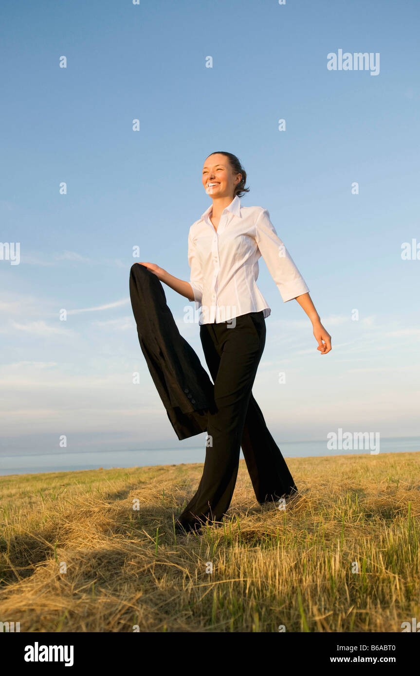 Woman looking up walking across hi-res stock photography and images - Alamy