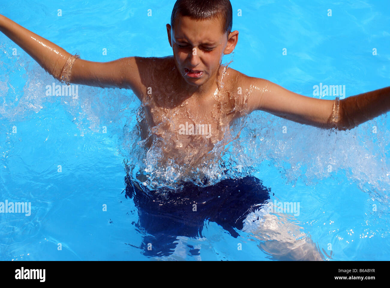 Jumping into Swimming Pool Stock Photo - Alamy