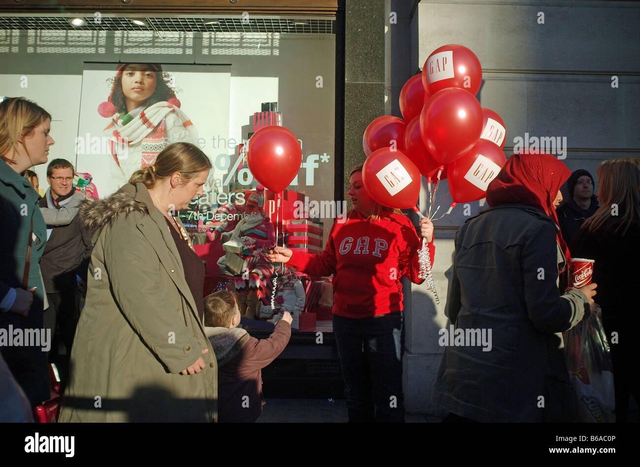 Handing out balloons hi-res stock photography and images - Alamy