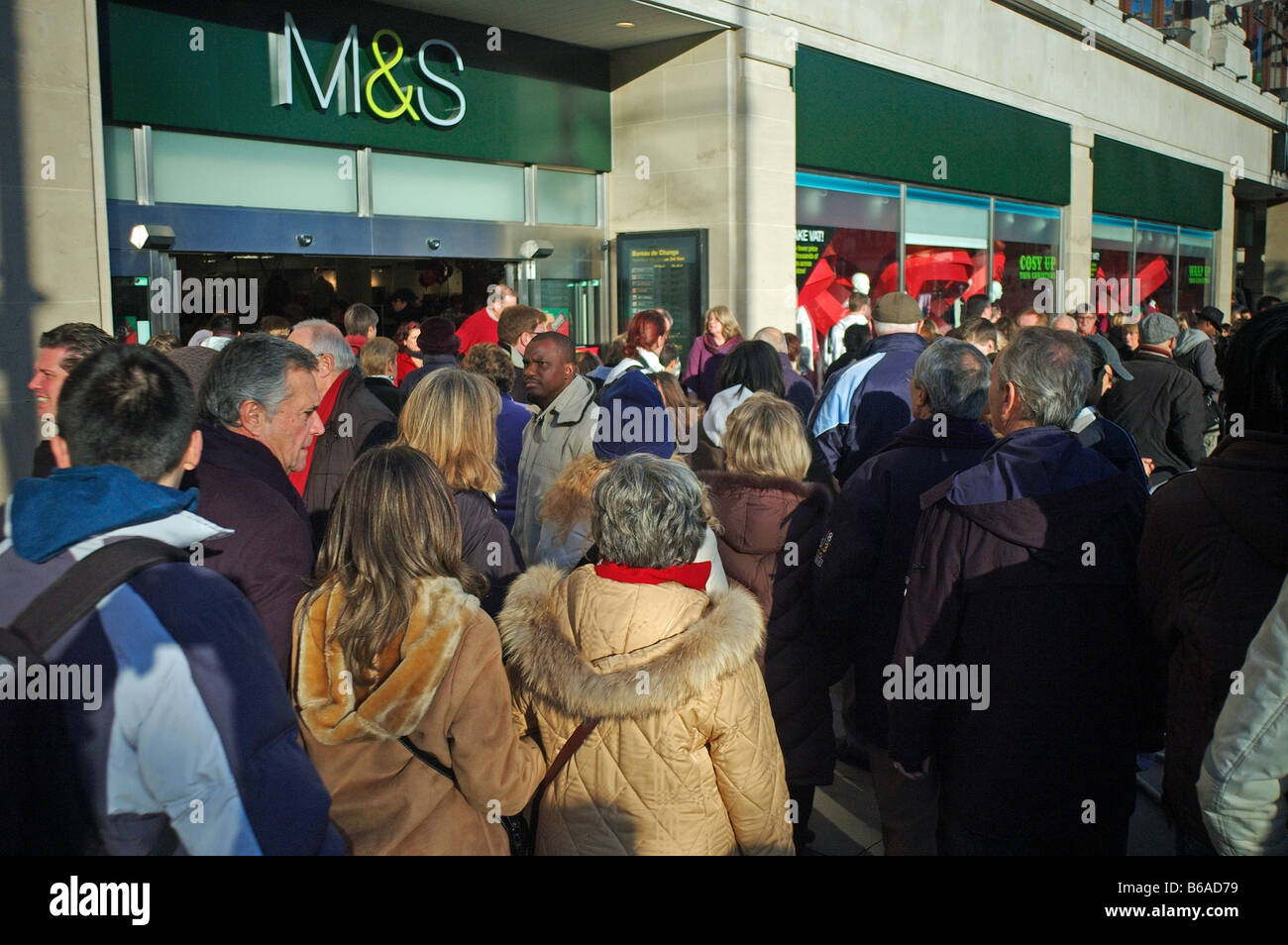 Crowd of shoppers outside Marks and Spencers Oxford Street London UK ...