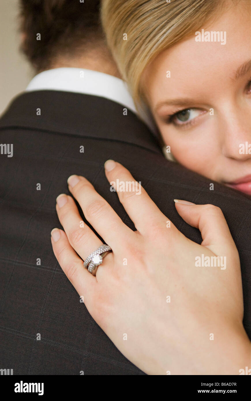 A bride hugs her husband Stock Photo - Alamy