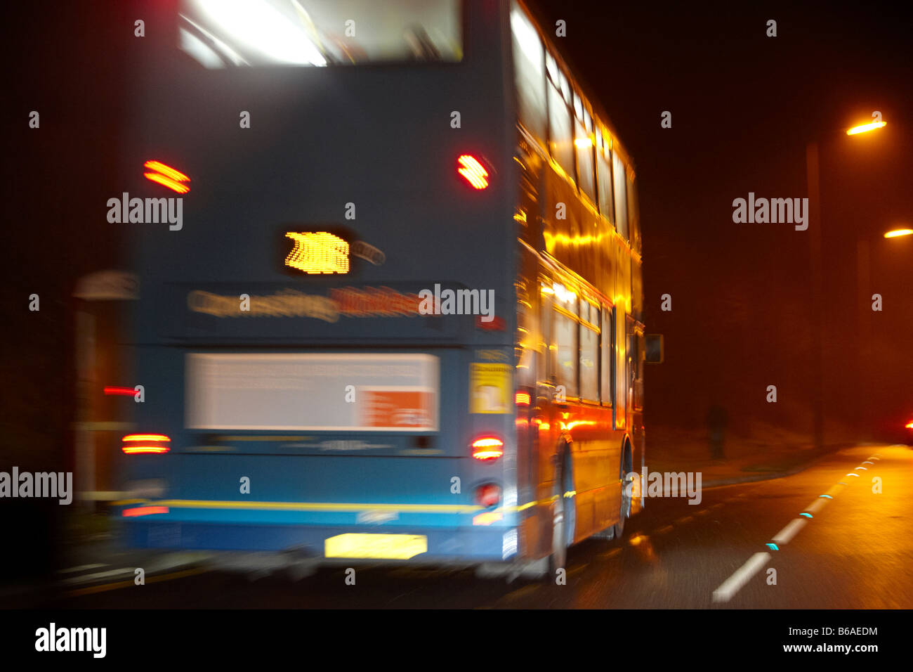 Bus at night Stock Photo - Alamy