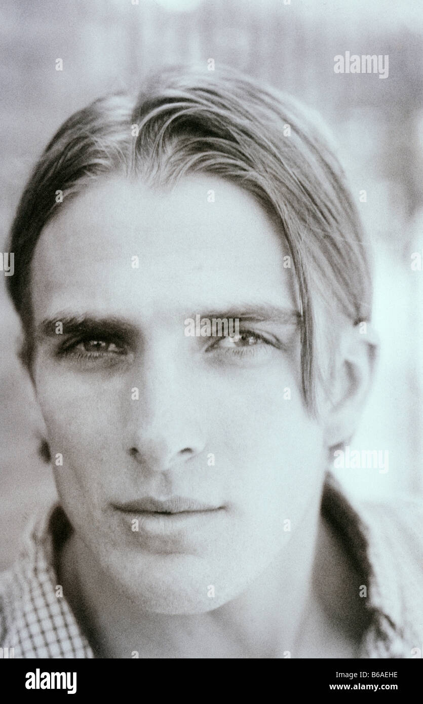 mid Adult man staring , portrait Stock Photo - Alamy