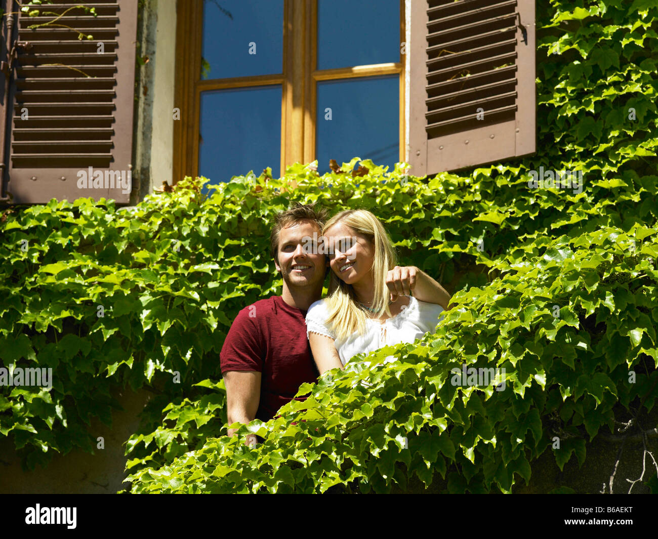 Couple looking at view Stock Photo - Alamy