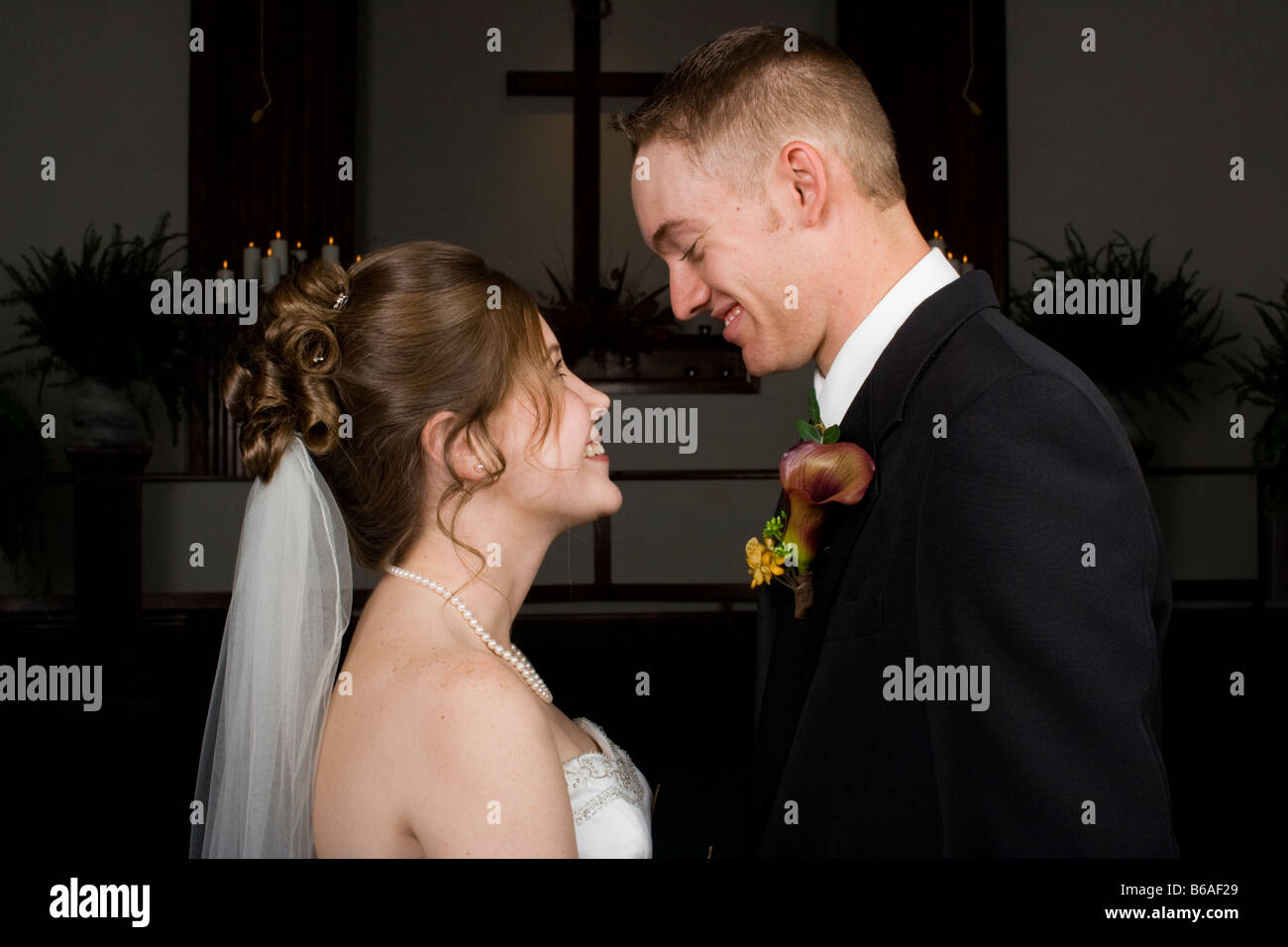 Bride and groom staring into each other's eyes Stock Photo - Alamy