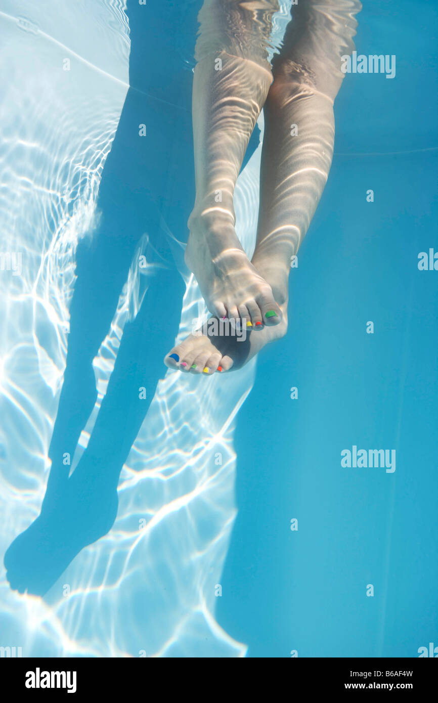 Woman legs underwater pool hi-res stock photography and images - Alamy