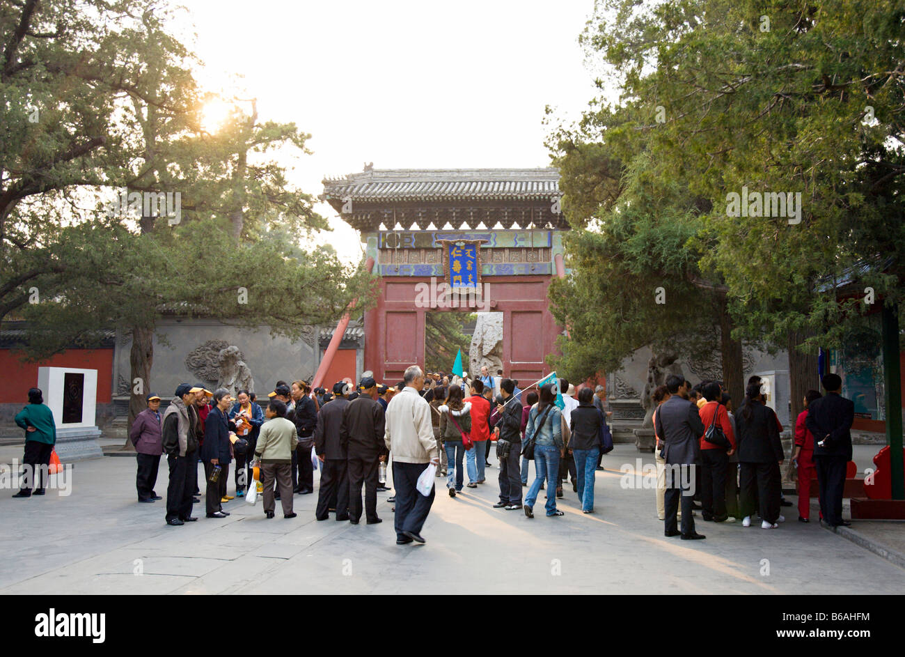 CHINA BEIJING Chinese tour group wearing matching baseball caps and ...