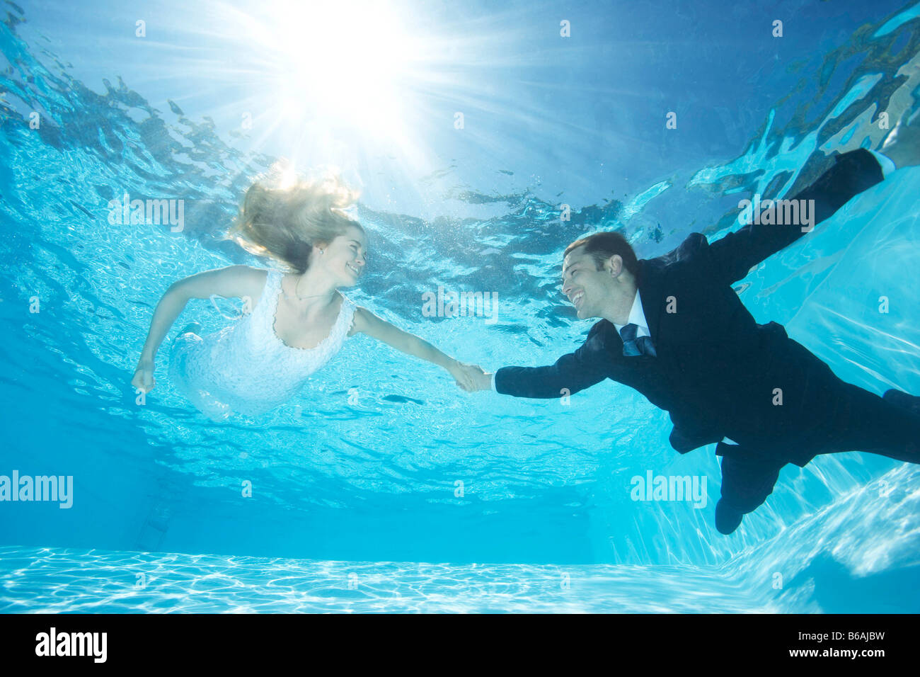 Clothed wet woman hi-res stock photography and images - Alamy