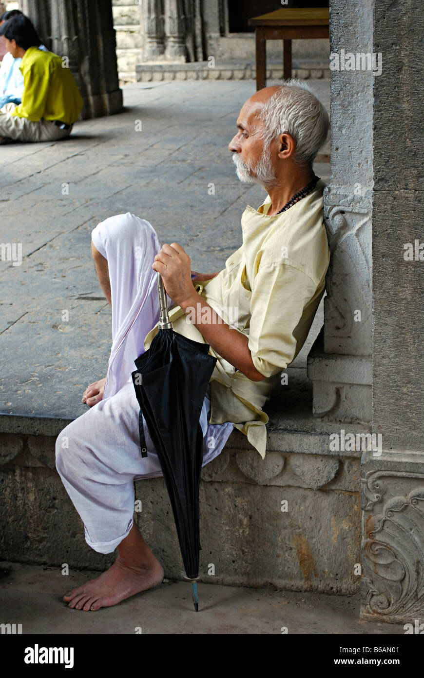 Old man resting inside the Rajwada, Indore, Madhya Pradesh, India Stock ...