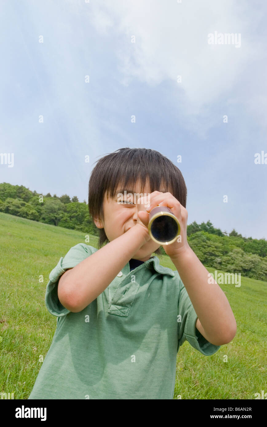 Boy using telescope hi-res stock photography and images - Alamy