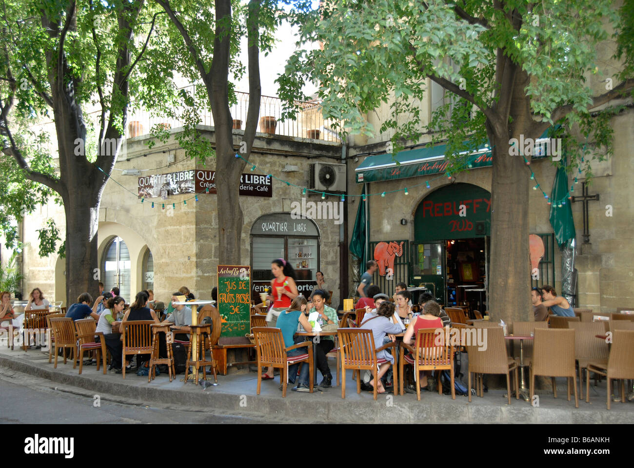 People sitting in beer garden of a bar, Montpellier, France Stock Photo ...
