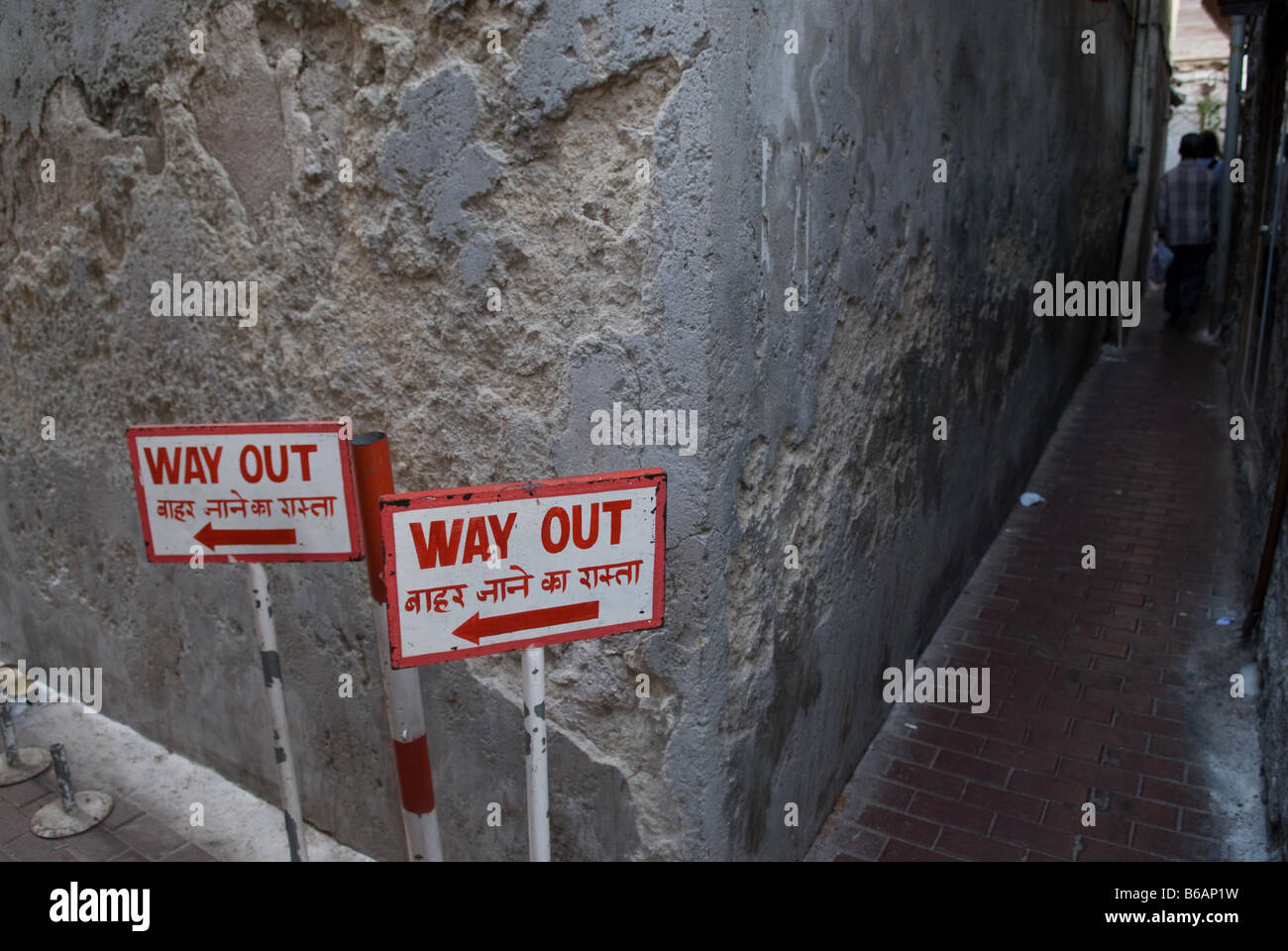 Signs showing the way out in Old Dubai, UAE Stock Photo - Alamy