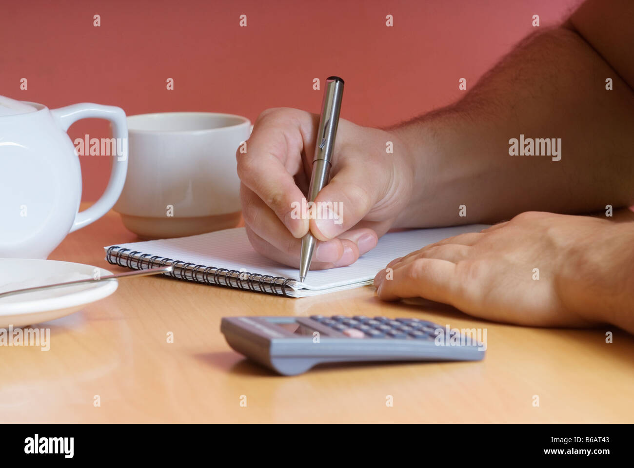 Man writing in notepad, close-up Stock Photo - Alamy