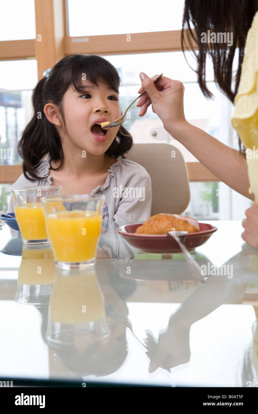 Asian girl eating 6 hi-res stock photography and images - Alamy