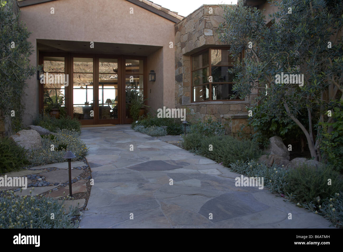 Stone pathway to entry Stock Photo - Alamy