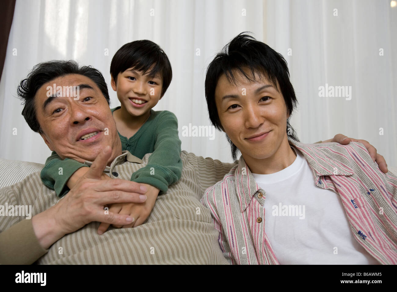 Portrait of three generation family Stock Photo - Alamy