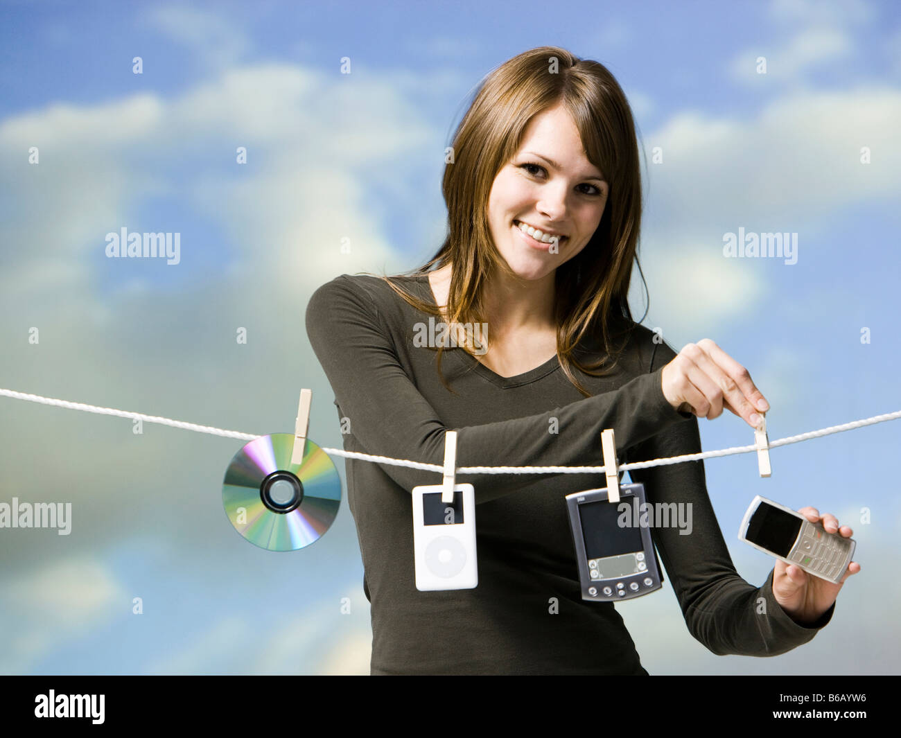 woman hanging electronics out to dry Stock Photo - Alamy