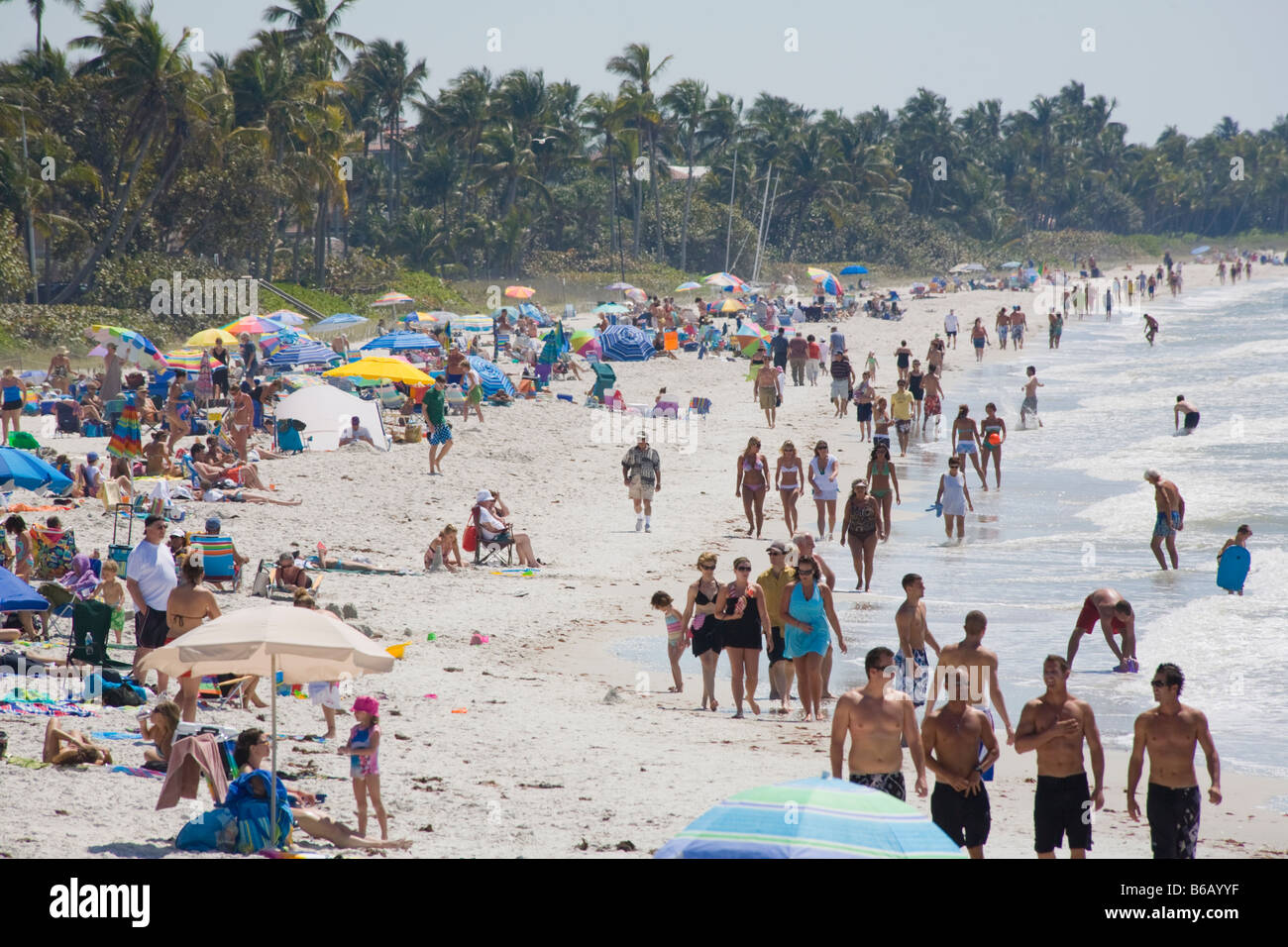 Spring break and vacation crowds on Naples Beach on the southwest Gulf ...