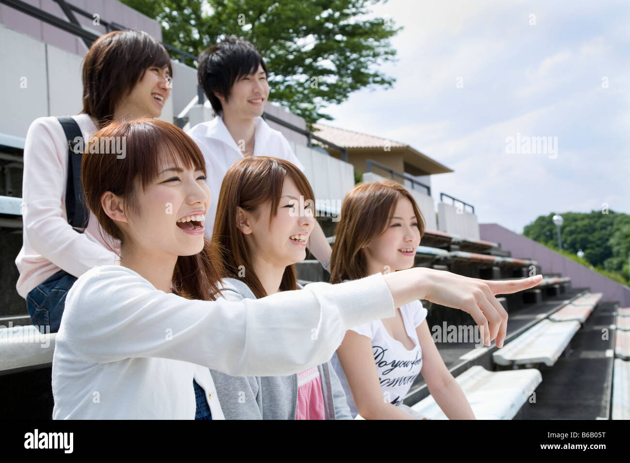 College students cheering at stadium Stock Photo - Alamy
