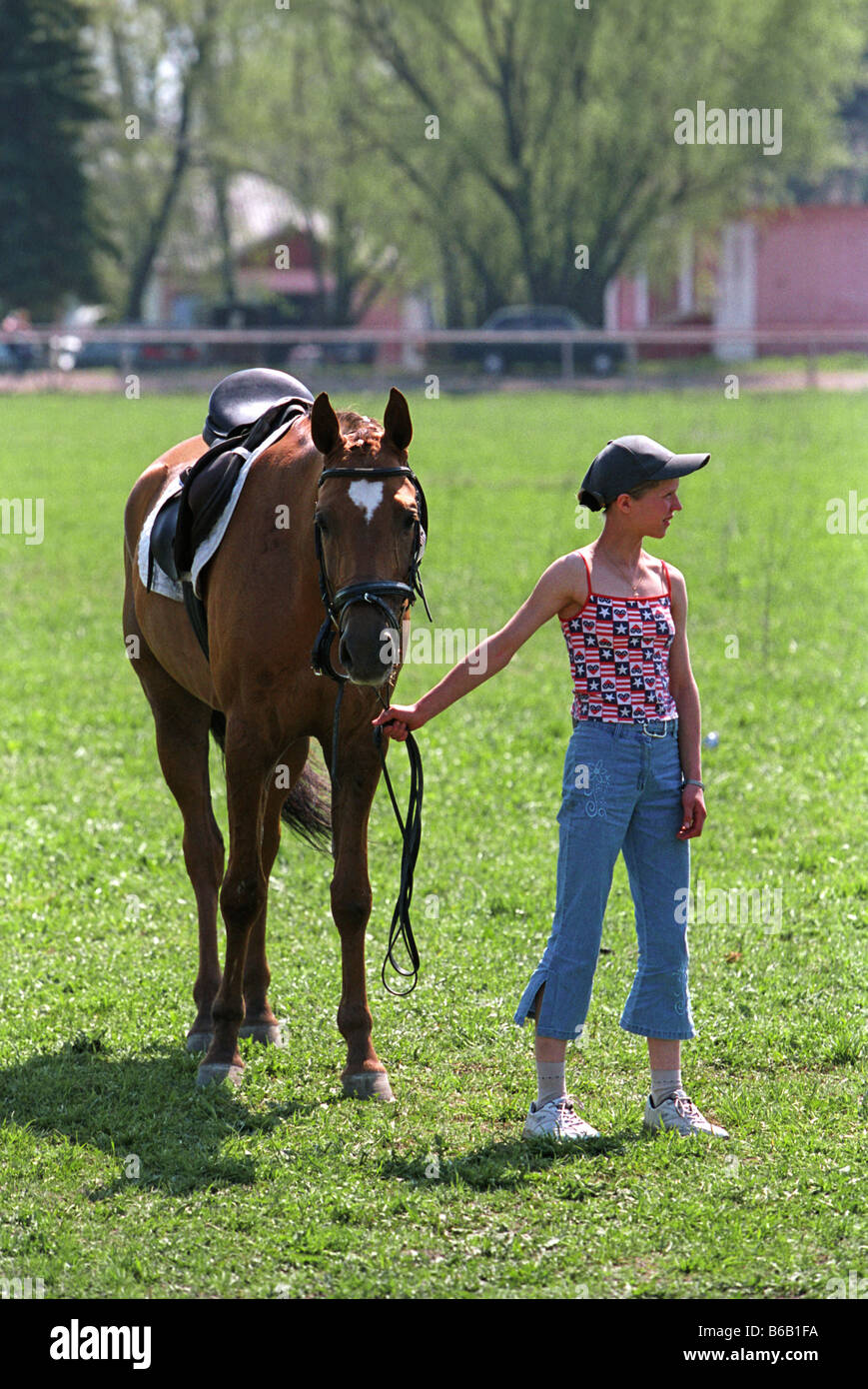 Horse and kid Stock Photo - Alamy