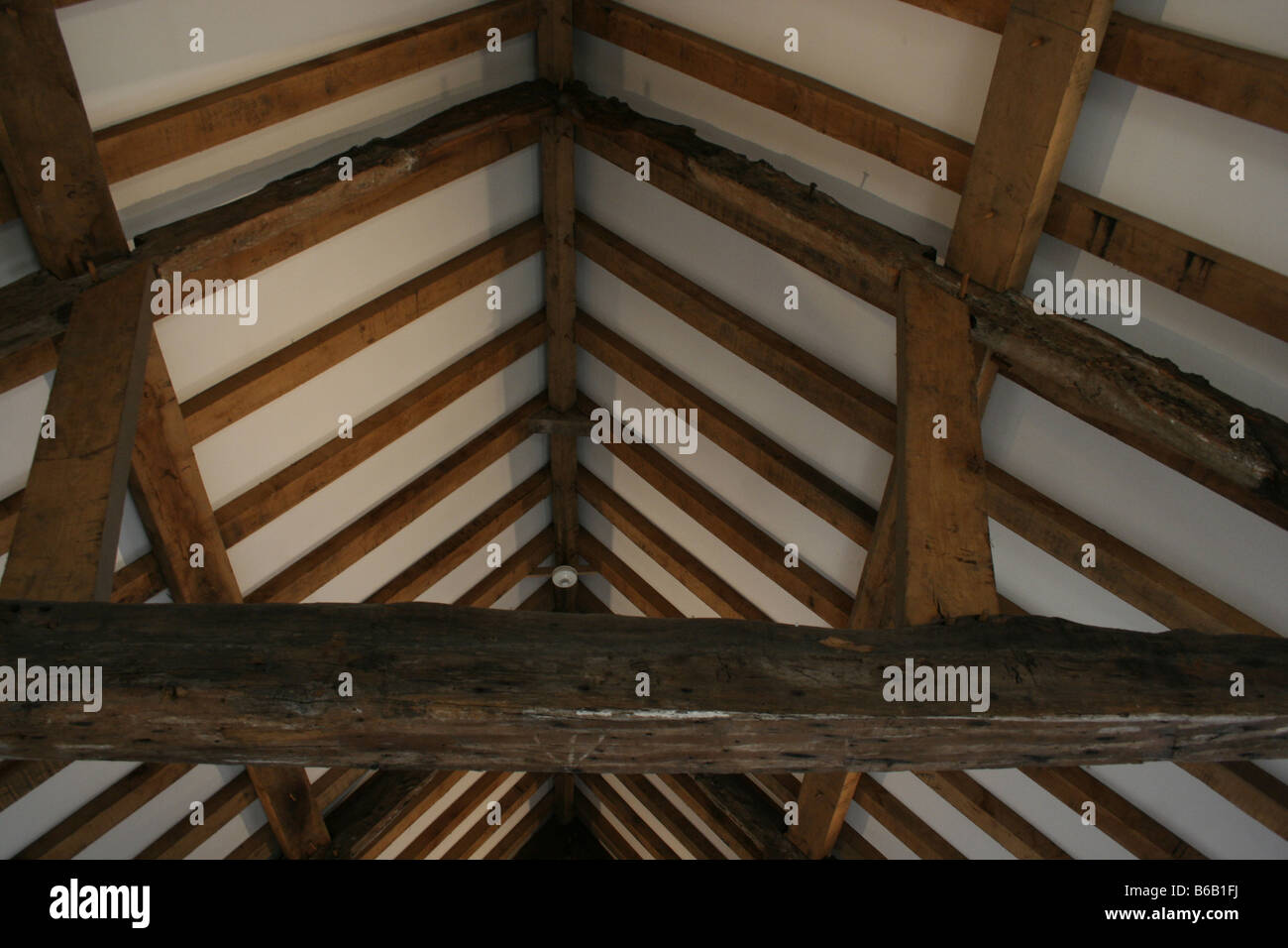 old traditional A framed exposed beams in the ceiling of an A listed ...