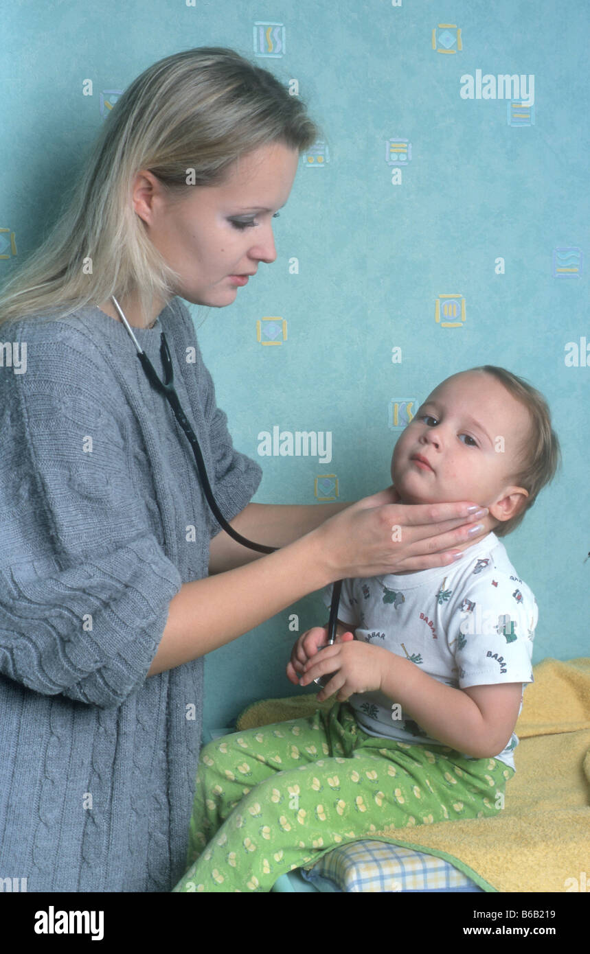 Baby getting Checkup Stock Photo - Alamy