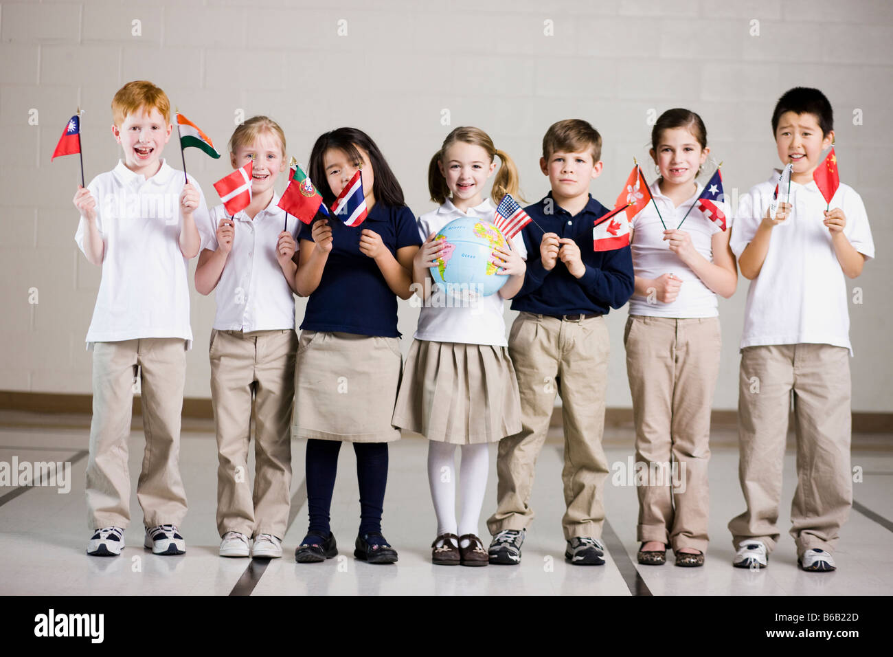 school children waving flags of different countries Stock Photo - Alamy